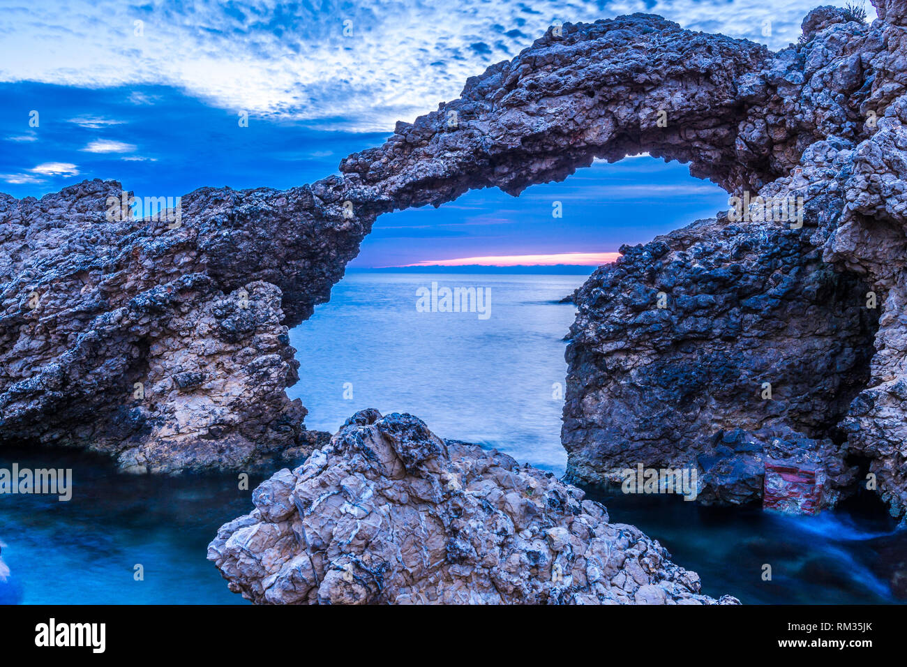 Blue hour at the sea Stock Photo - Alamy