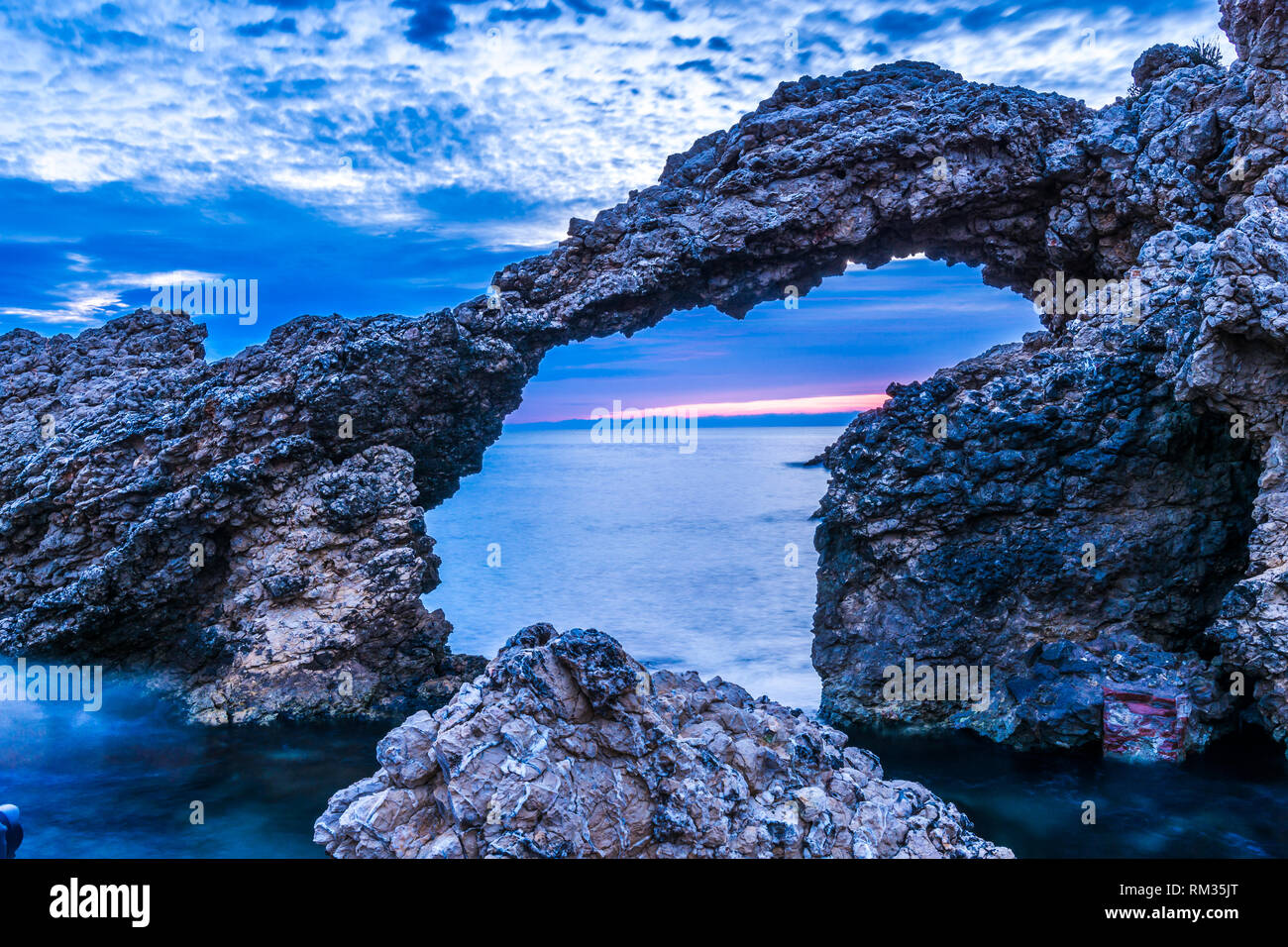 Blue hour at the sea Stock Photo - Alamy