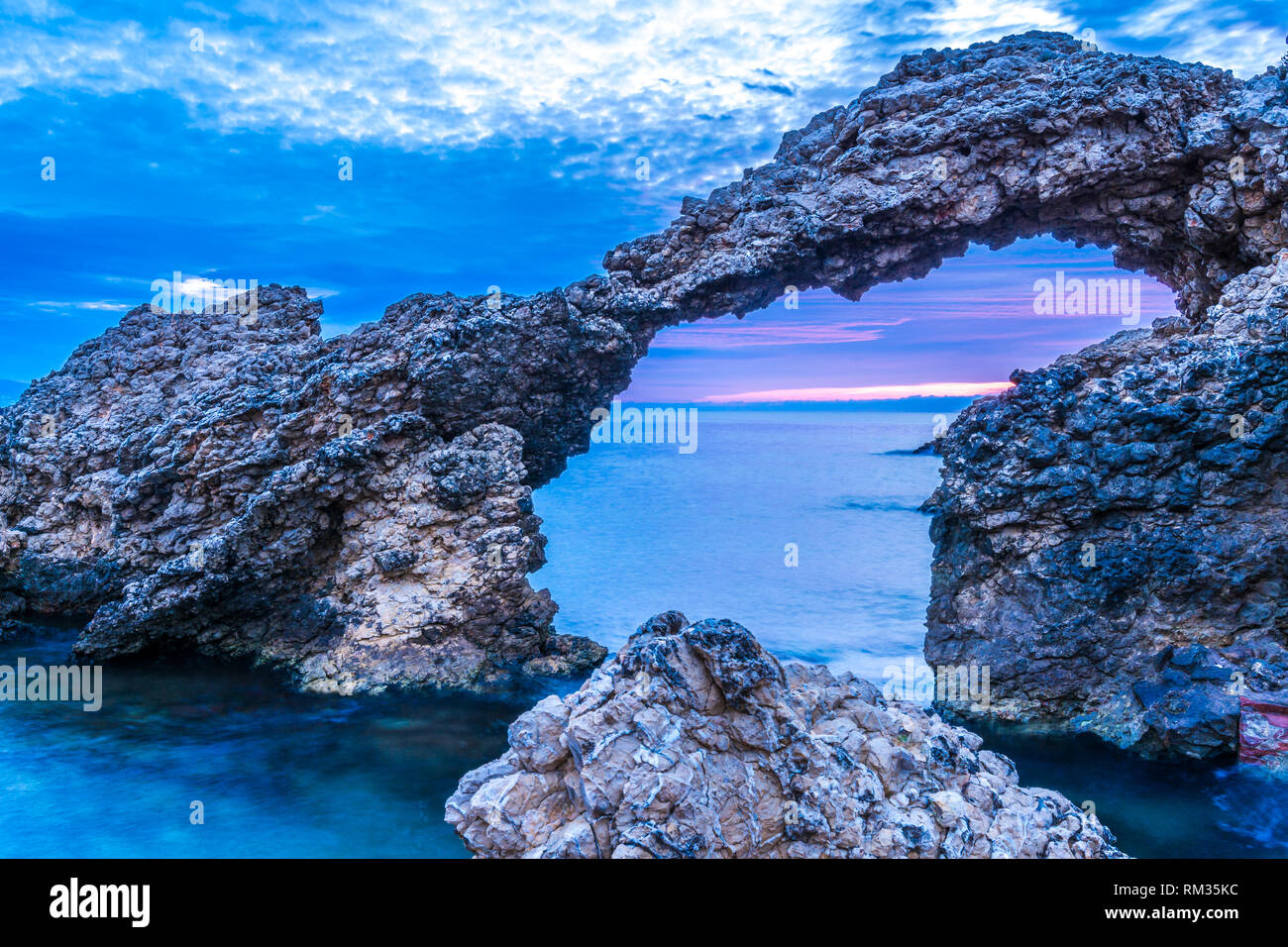 Blue hour at the sea Stock Photo - Alamy