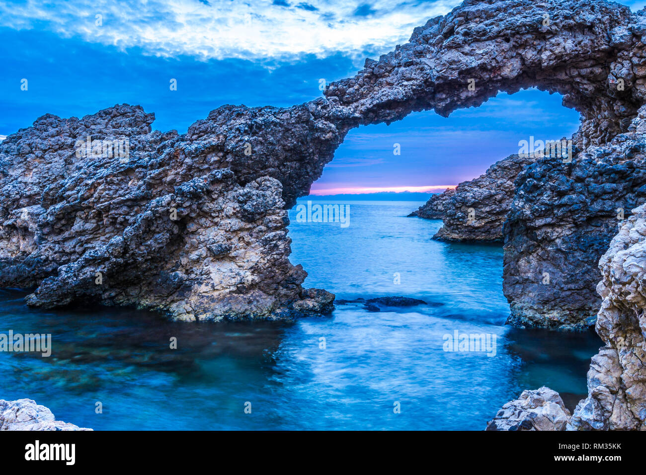 Blue hour at the sea Stock Photo - Alamy