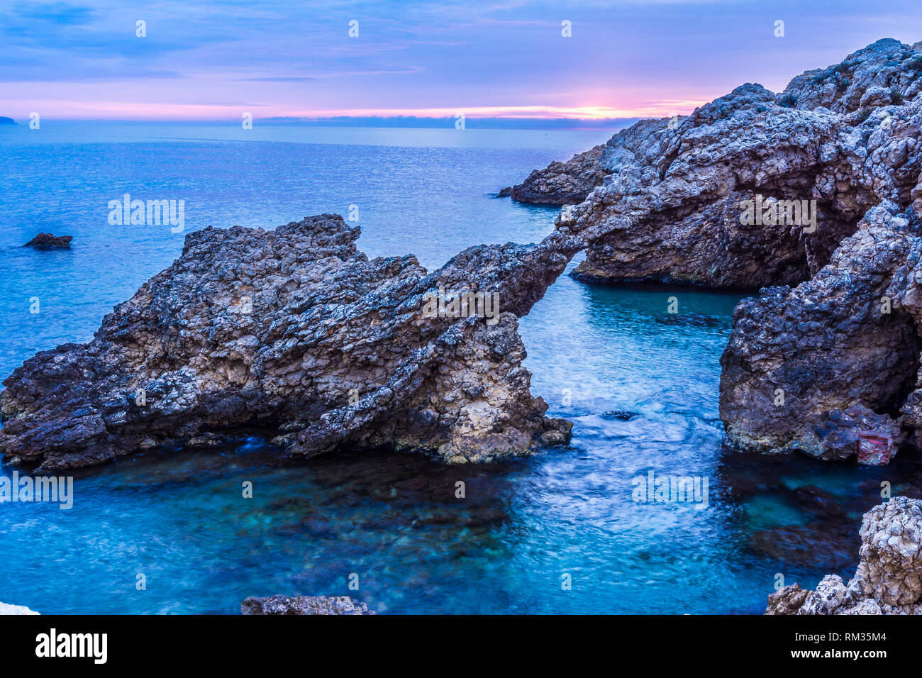 Blue hour at the sea Stock Photo - Alamy