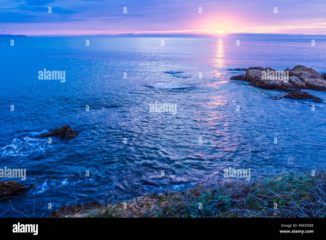 Sunrise at the mediterranean sea Stock Photo - Alamy