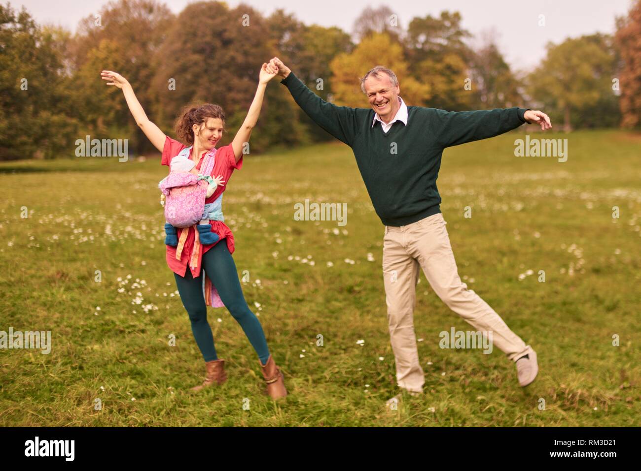 couple, baby, family, age difference, outdoors, in park, generations ...