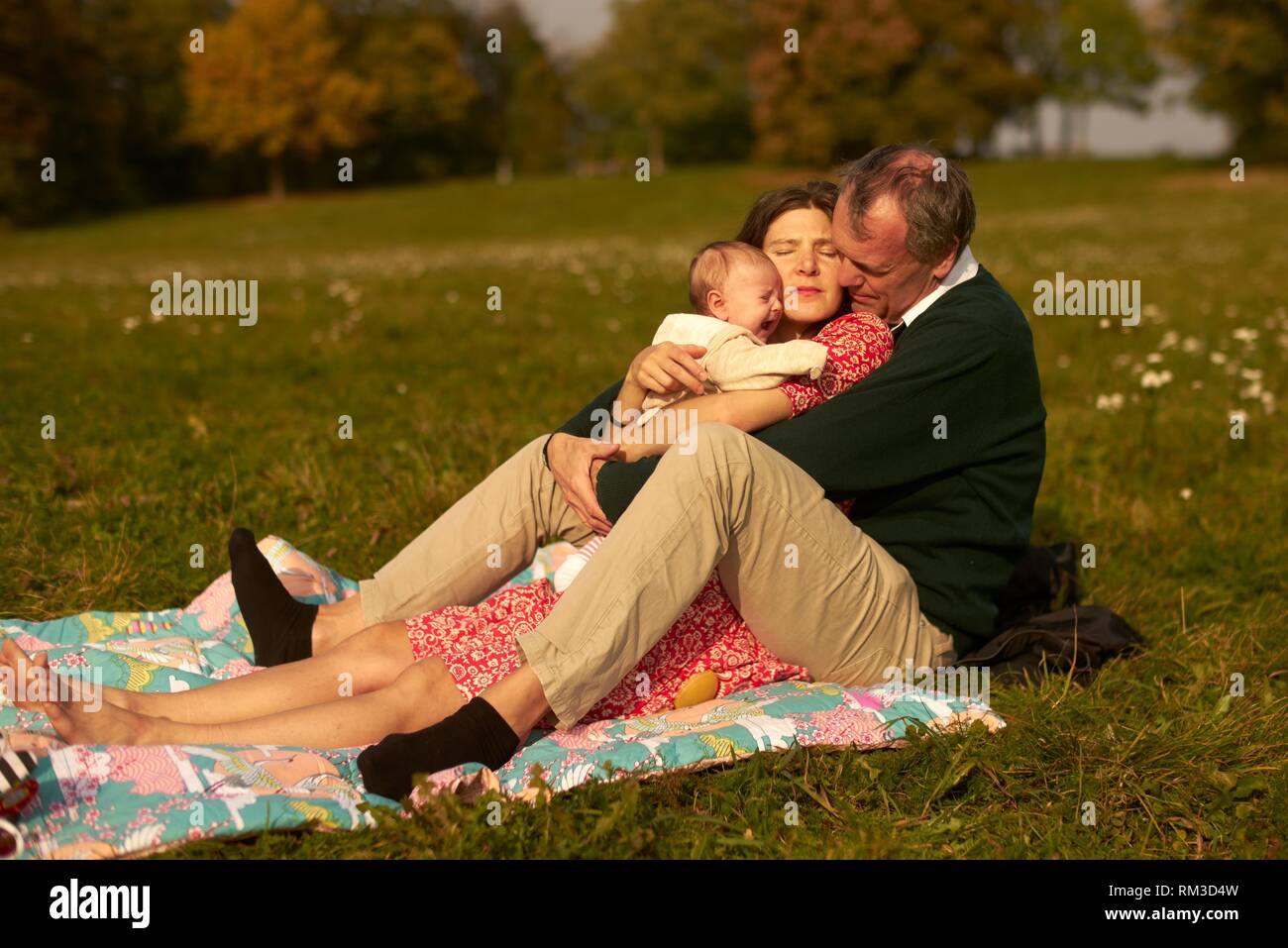 couple, baby, family, age difference, outdoors, in park, generations ...