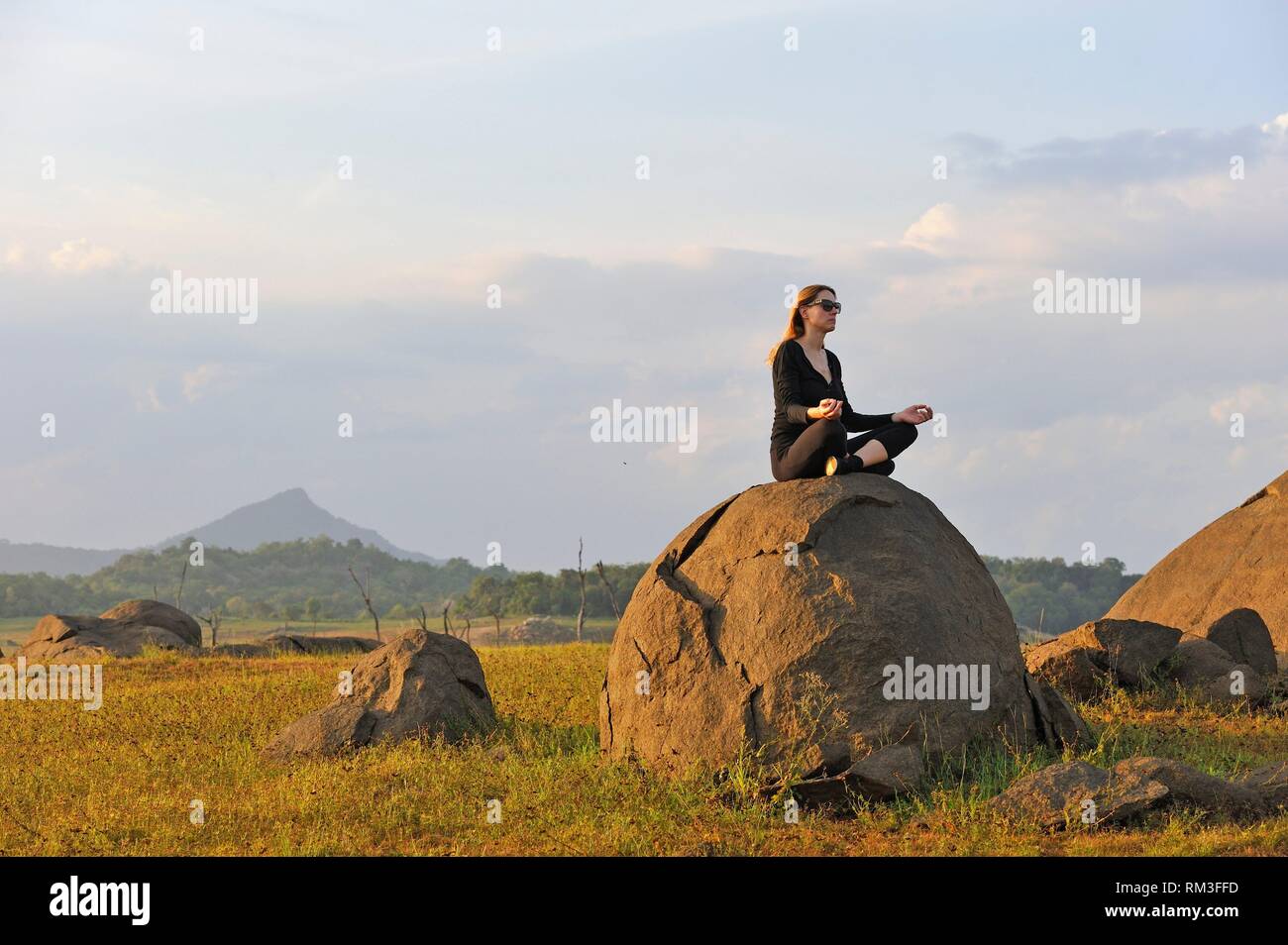 Woman practising yoga meditation by hi-res stock photography and images ...
