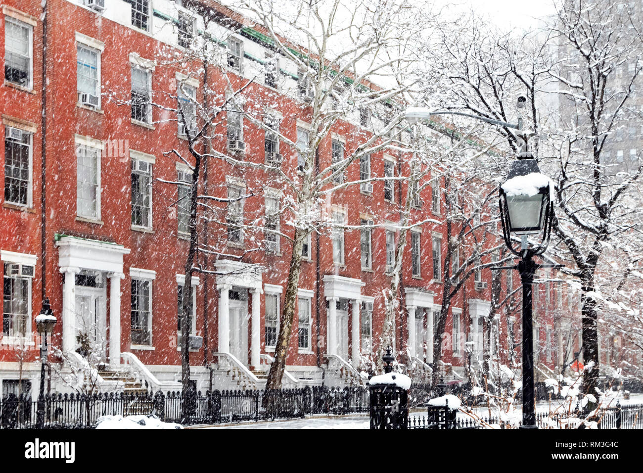 Snow covered winter street scene with old buildings along Washington ...