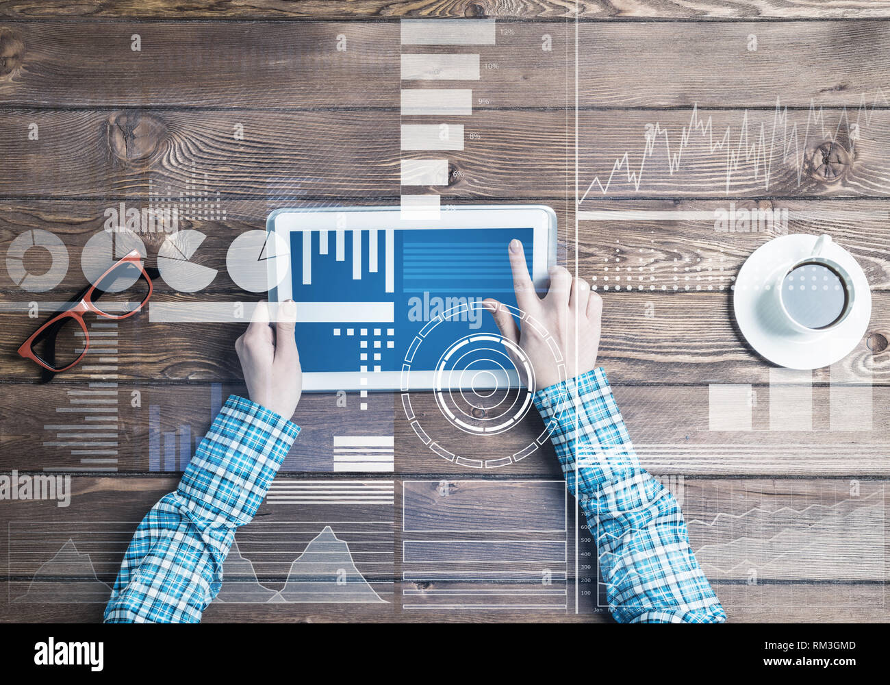 Business workplace with tablet device coffee cup and media interface ...