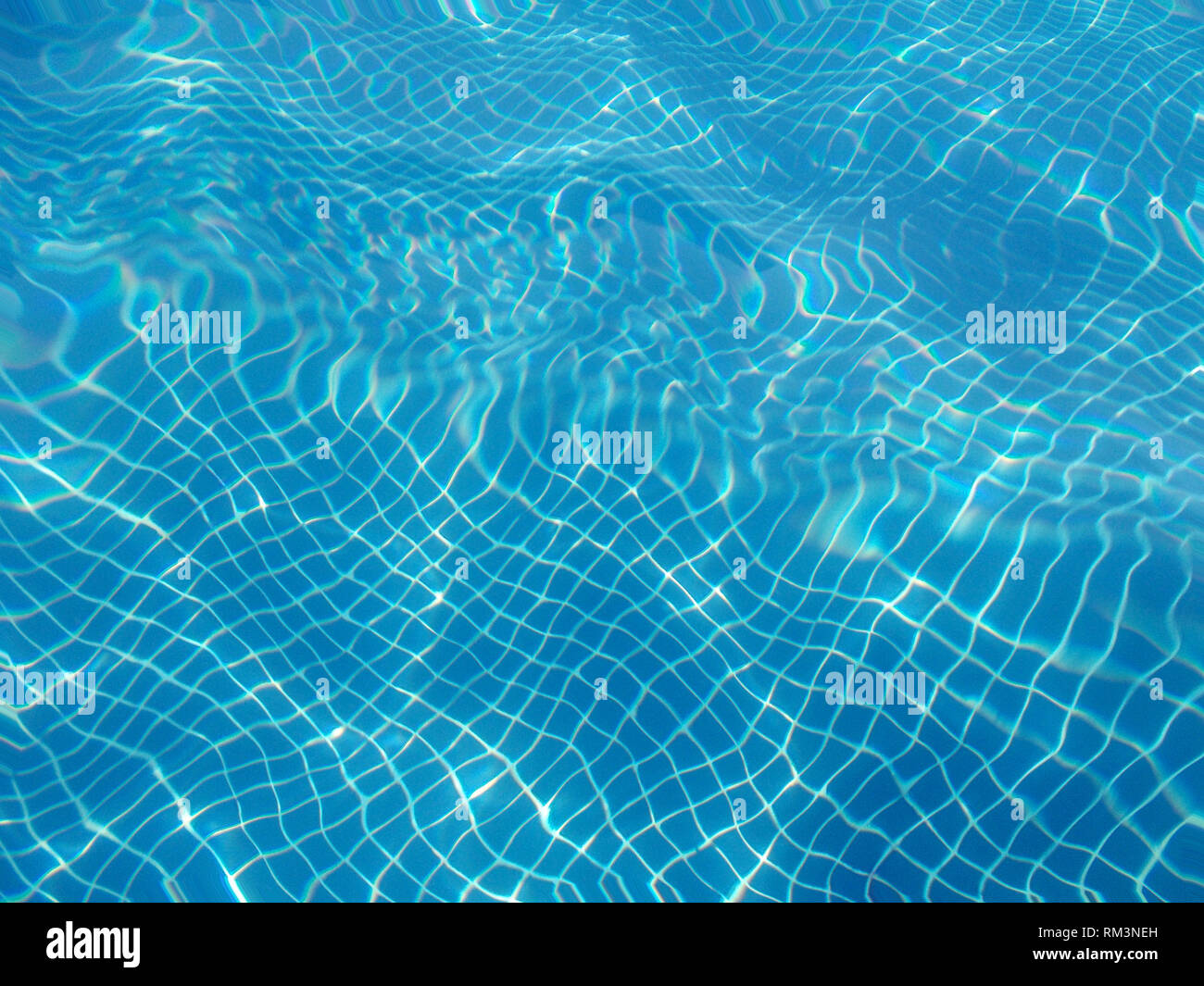 Water reflections on a swimming pool. Underwater photography ...