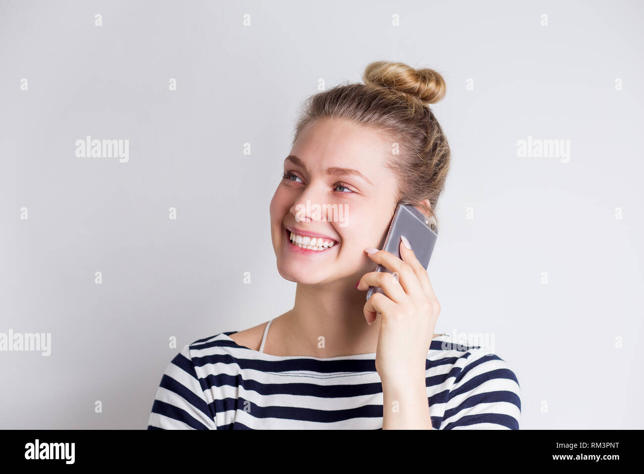 Happy woman phone talking. Face with toothy smile, isolated over white ...