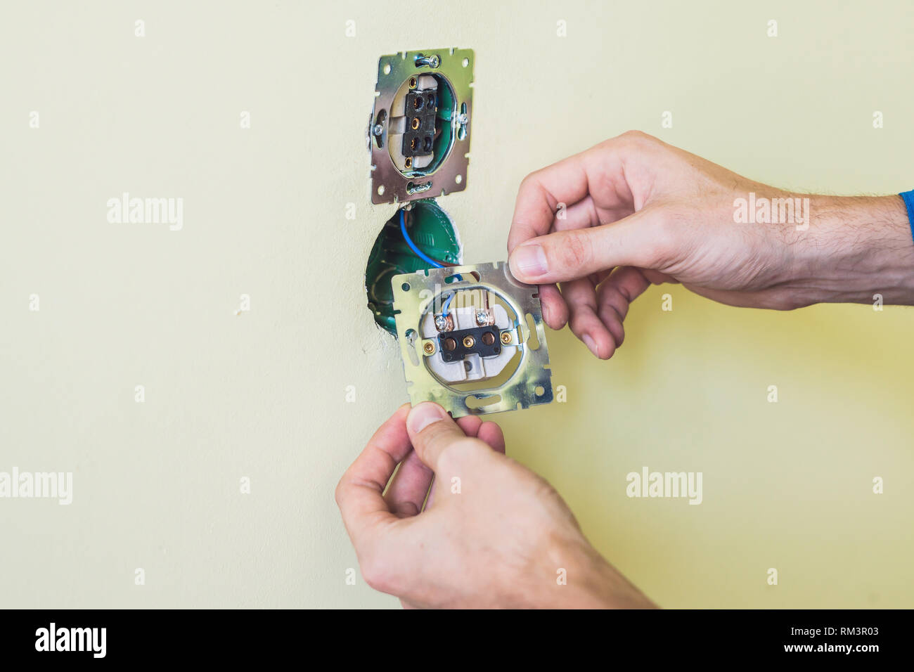 Installing socket hi-res stock photography and images - Alamy