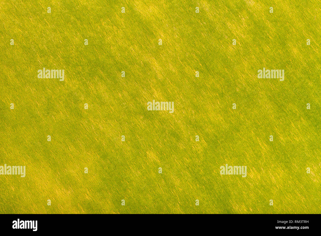 Construction of light yellow and bright green background of felt fabric ...