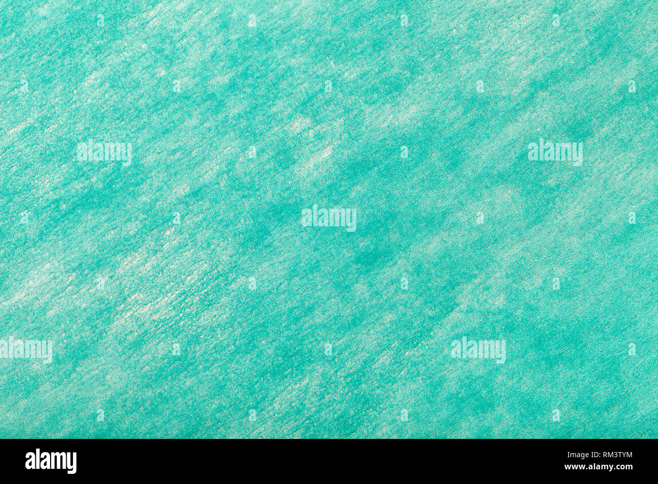 Construction of a light turquoise background with white spots of felt ...