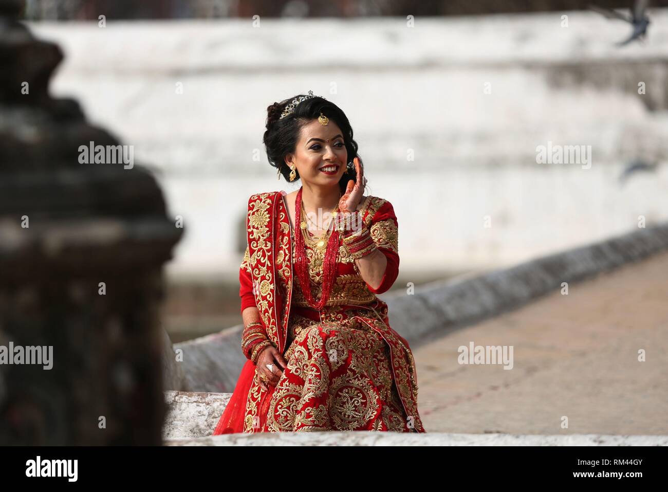 Kathmandu, Nepal. 13th Feb, 2019. A bride poses for a picture on the ...