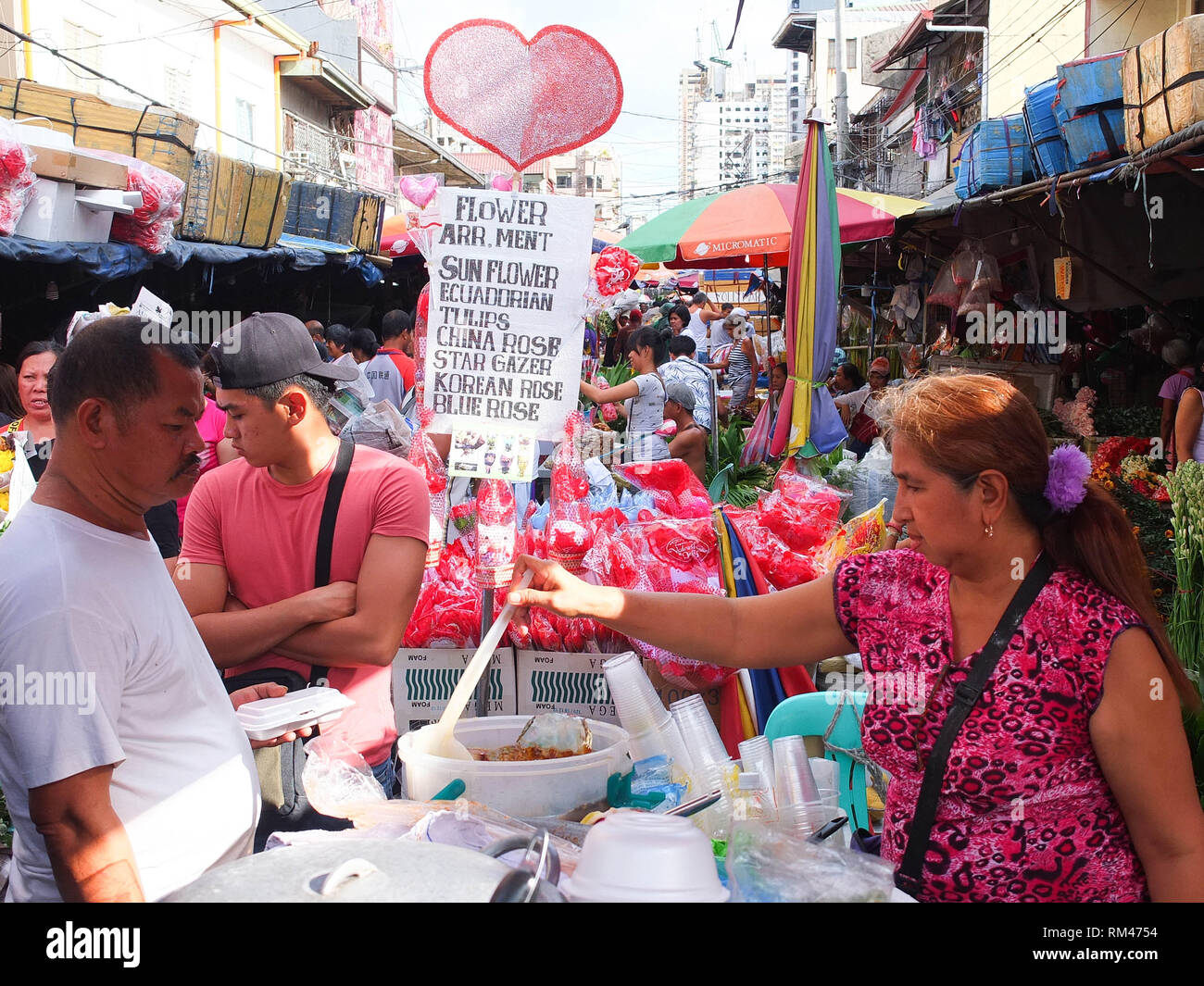 Manila philippines market woman hi-res stock photography and images - Alamy