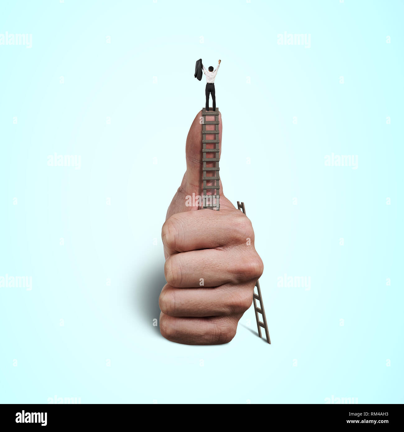 Cheering on top of thumb with wooden ladder Stock Photo - Alamy