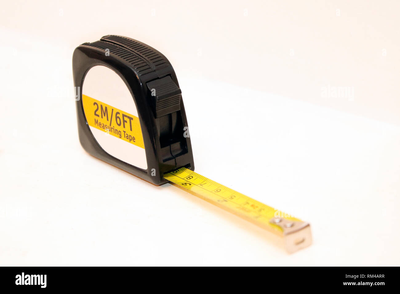 Yellow Tape Measure Stock Photo - Alamy