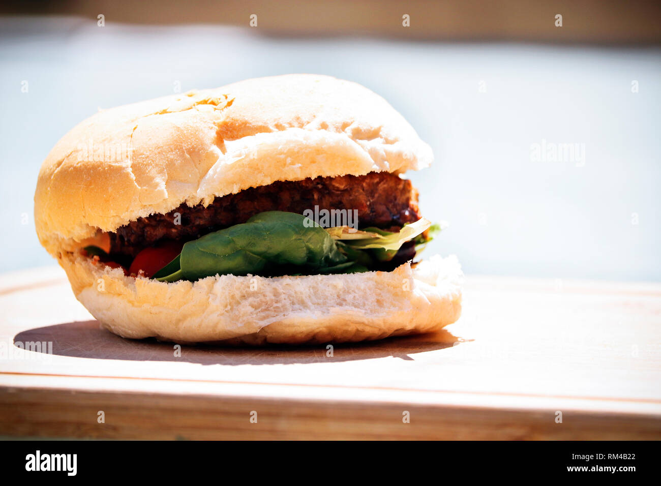 Burger in a roll Stock Photo - Alamy