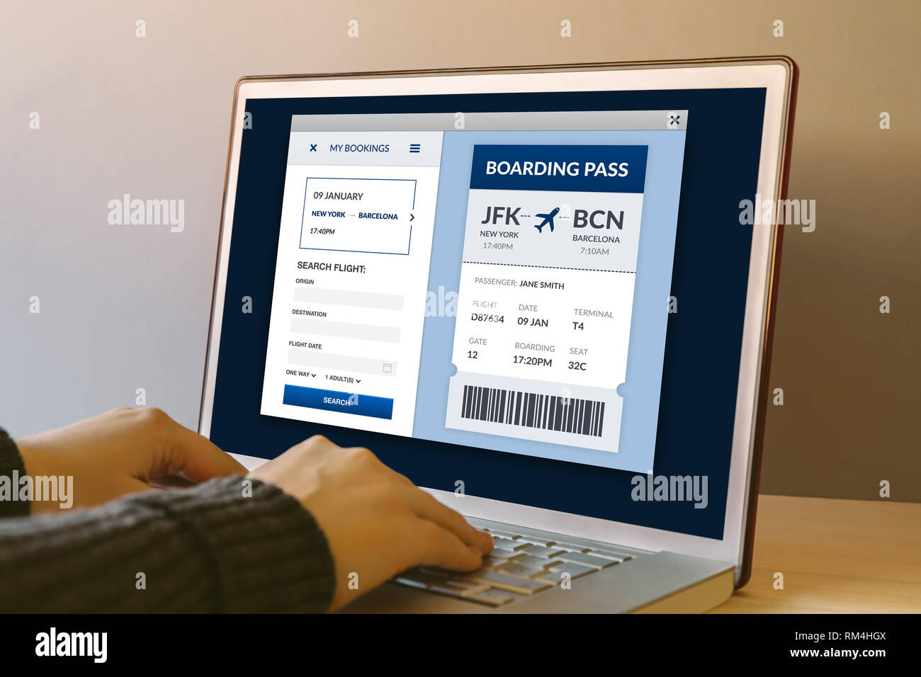 Boarding pass concept on laptop computer screen on wooden table. Hands ...