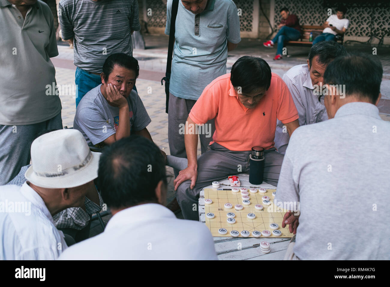 Chinese men playing mahjong hi-res stock photography and images - Alamy