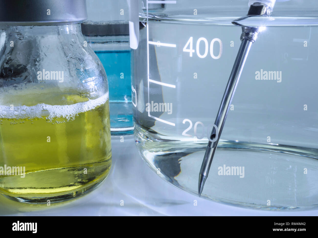 Laboratory instruments, medicine vial with flask, conceptual image ...