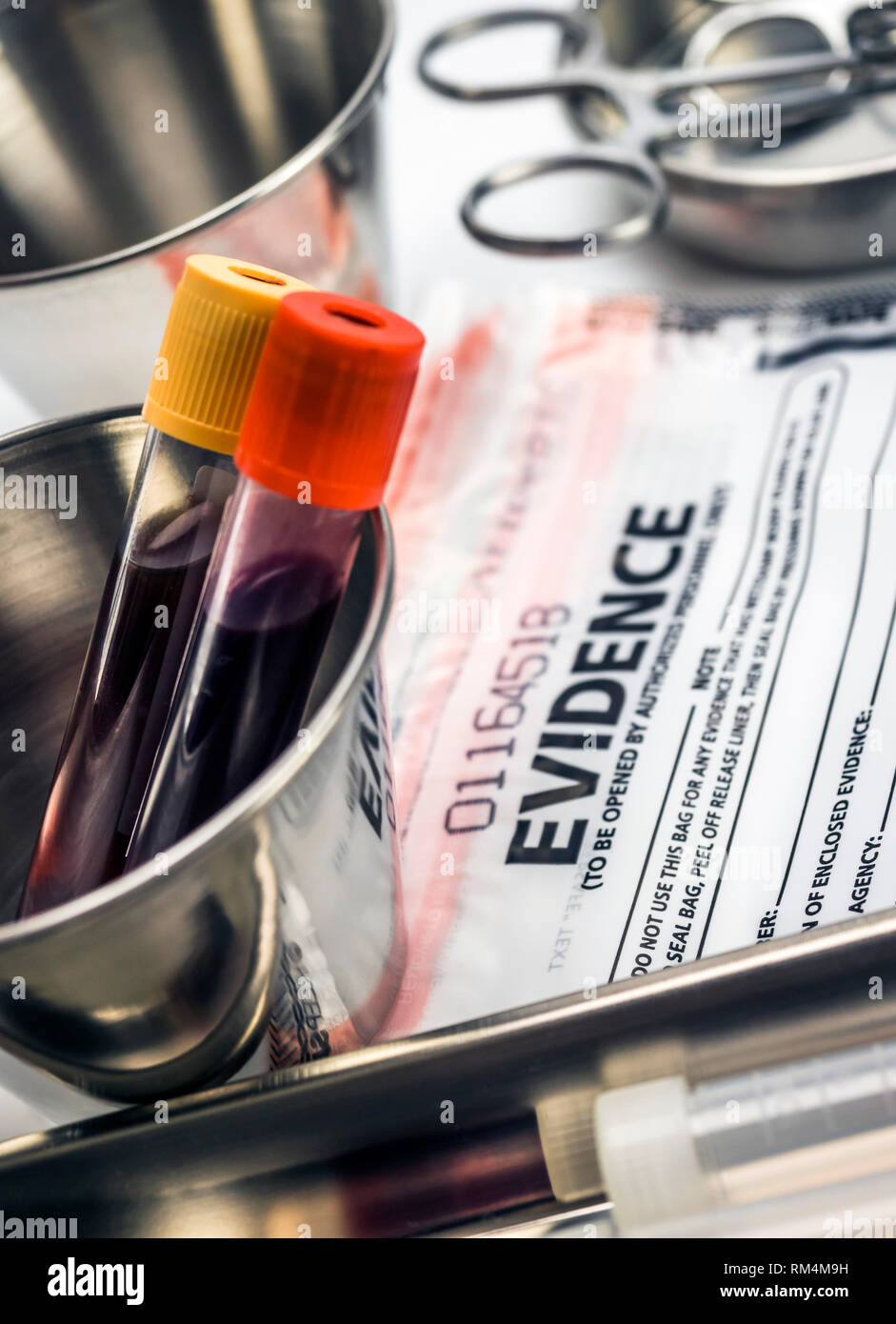 Evidence bag, Police scientific laboratory, conceptual image, vertical ...