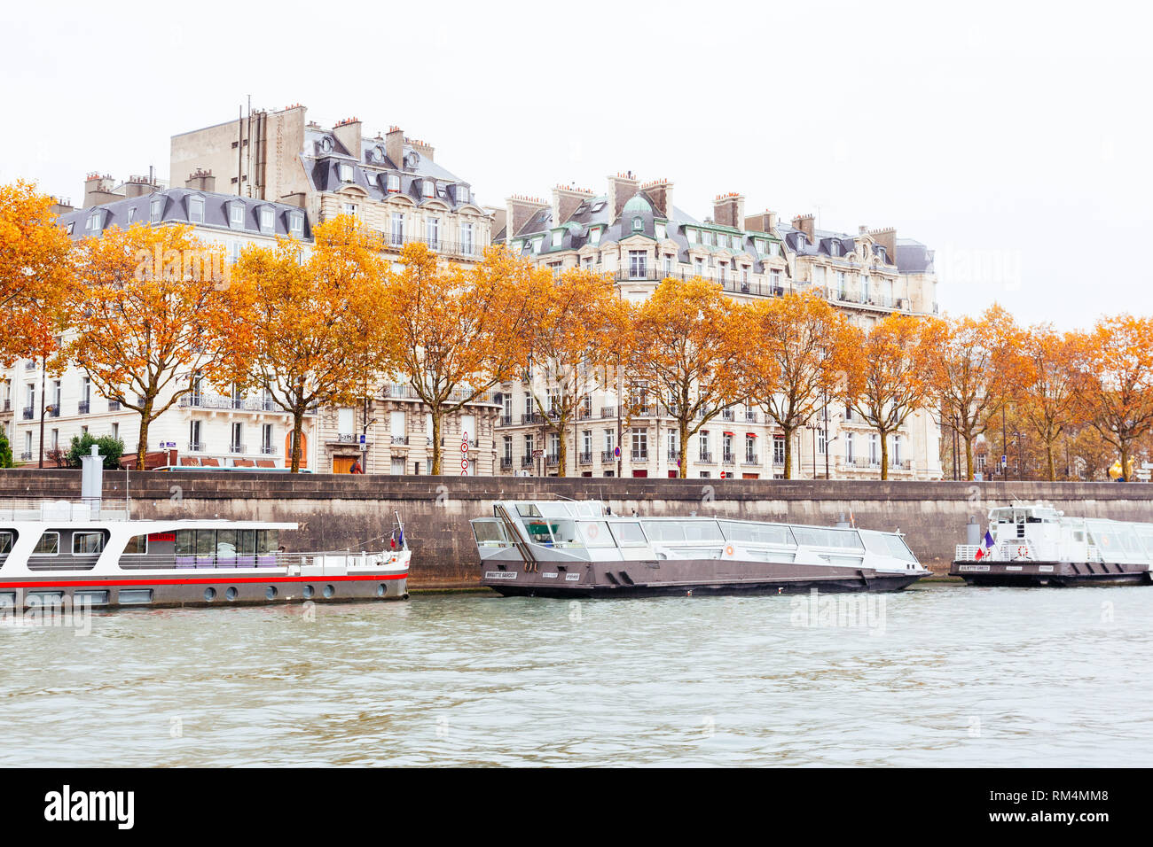 Paris (France) - Fall colors in a rainy day along the Seine Stock Photo ...