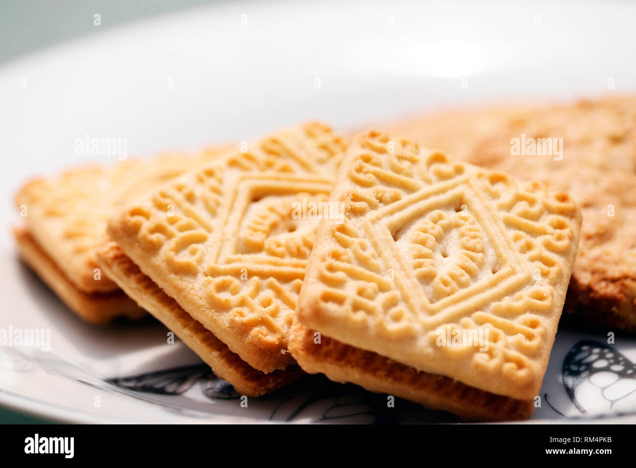 Biscuits on a plate Stock Photo - Alamy
