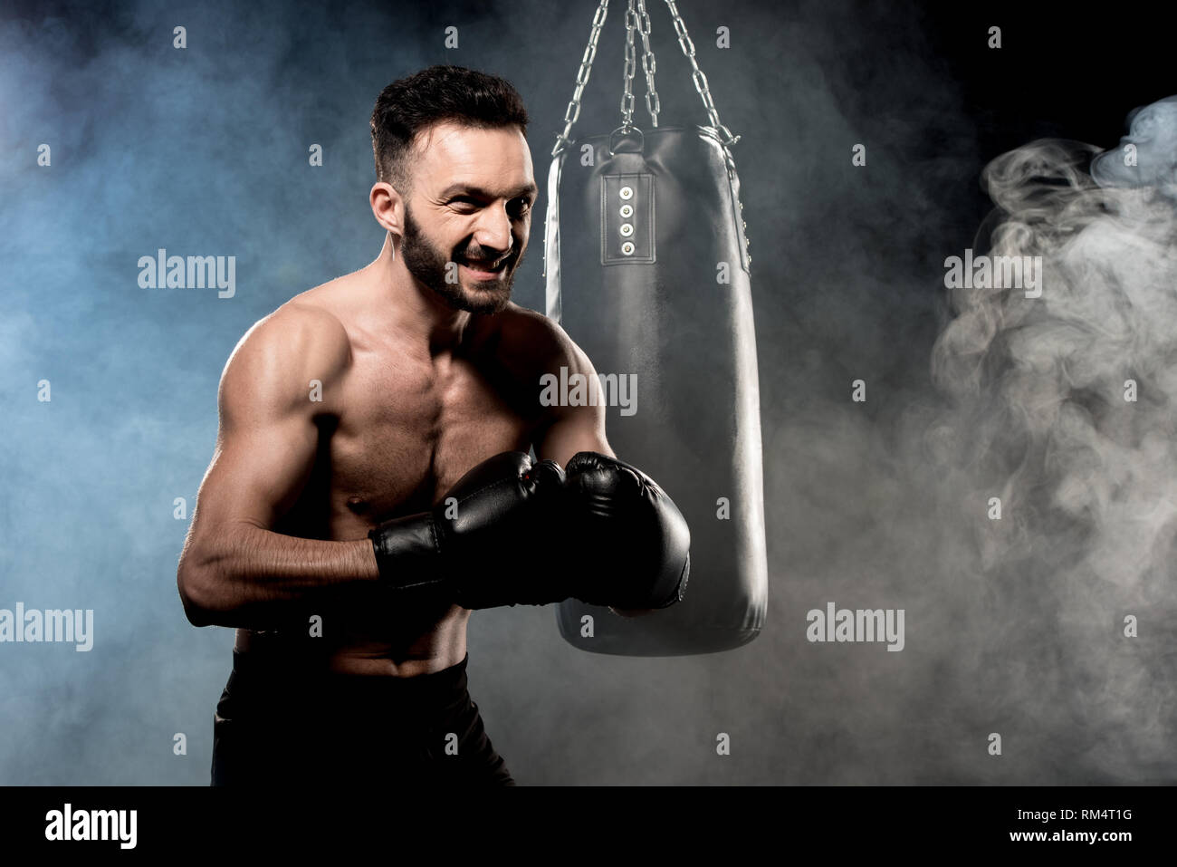 Boxer in punching pose hi-res stock photography and images - Alamy