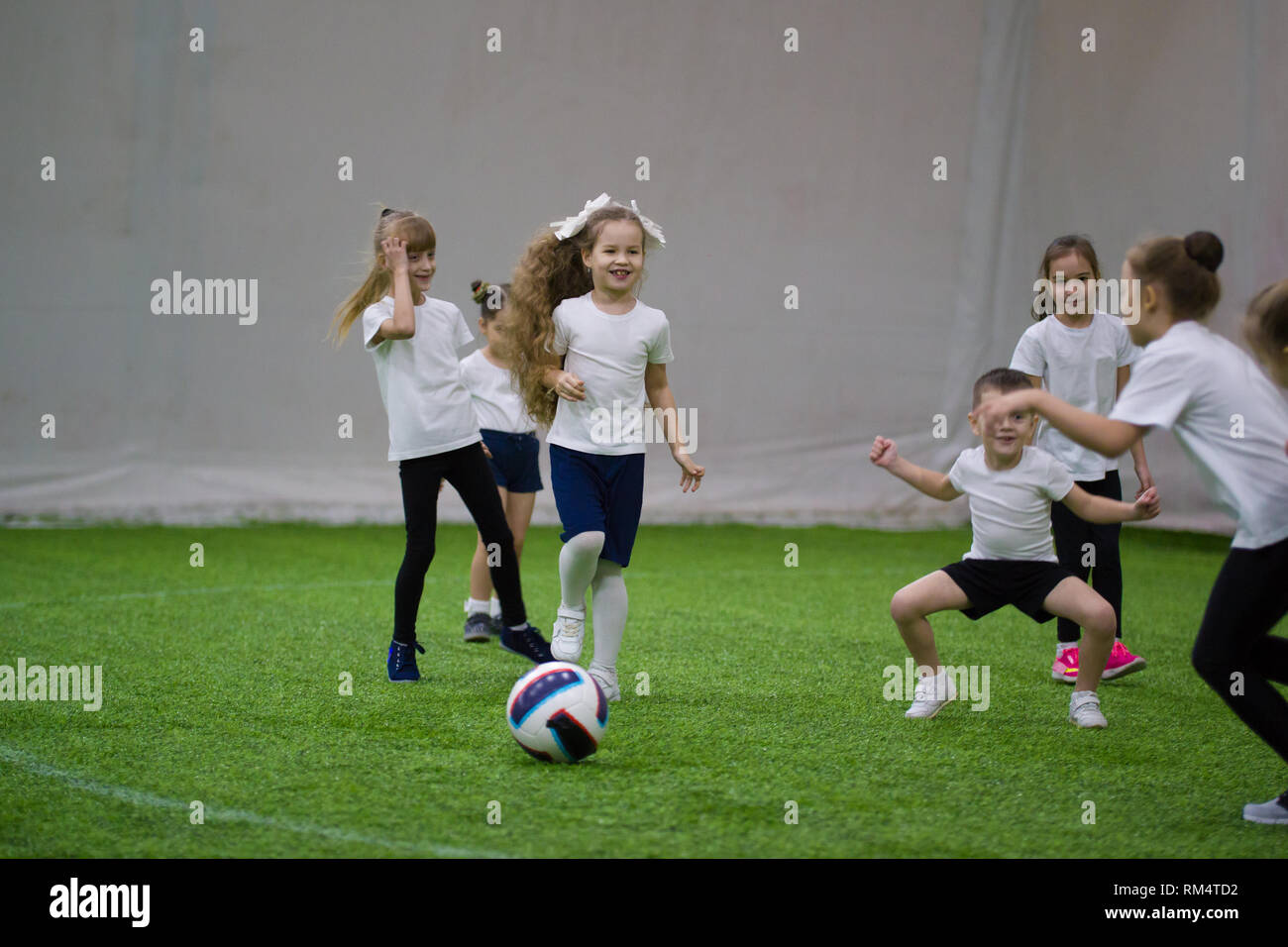 Girl Kicking Ball High Resolution Stock Photography and Images - Alamy