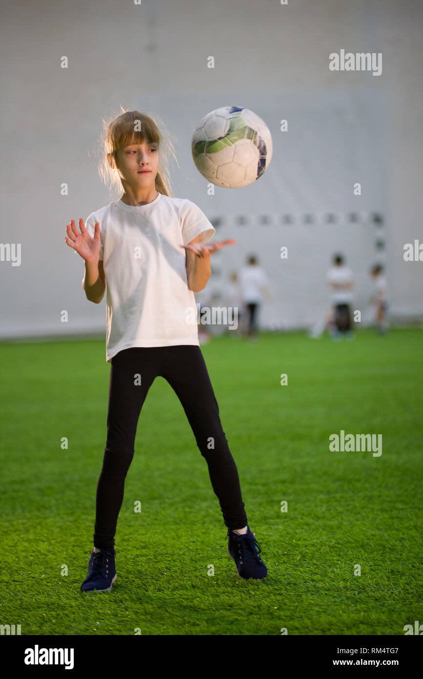 Girl Throwing Soccer Ball High Resolution Stock Photography and Images ...