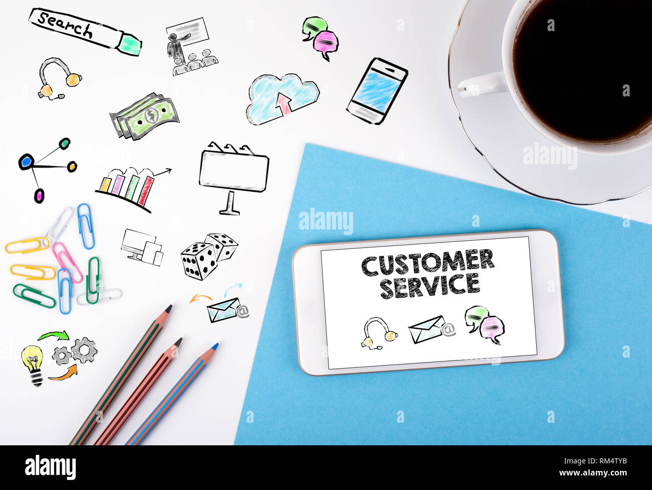 Customer service Concept. Mobile phone and coffee cup Stock Photo - Alamy