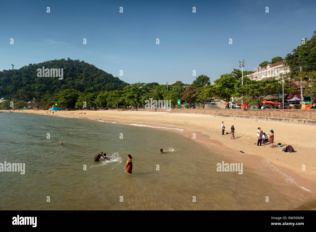 Cambodia, Kampot Province, Kep, beach, visitors bathing in sea Stock ...