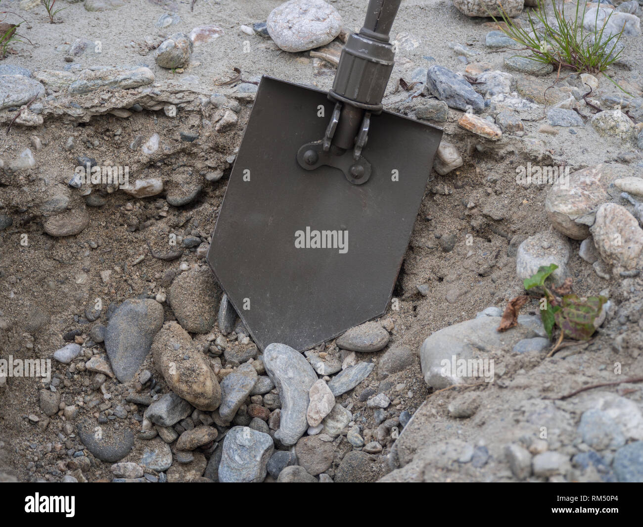 Dig a hole Stock Photo - Alamy