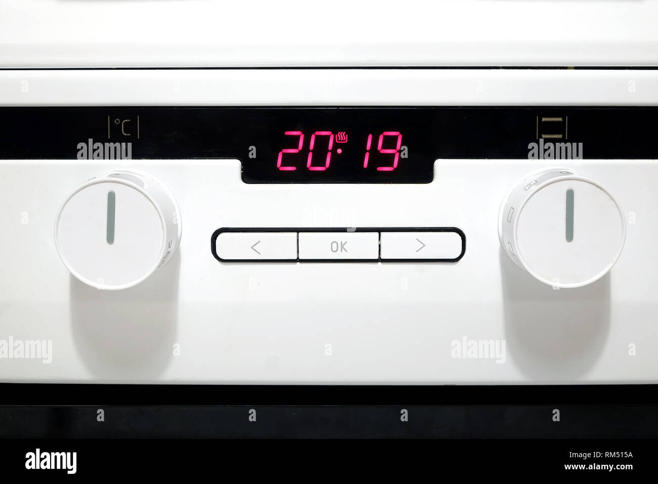 Control panel with red digits on electronic timer display, buttons and ...