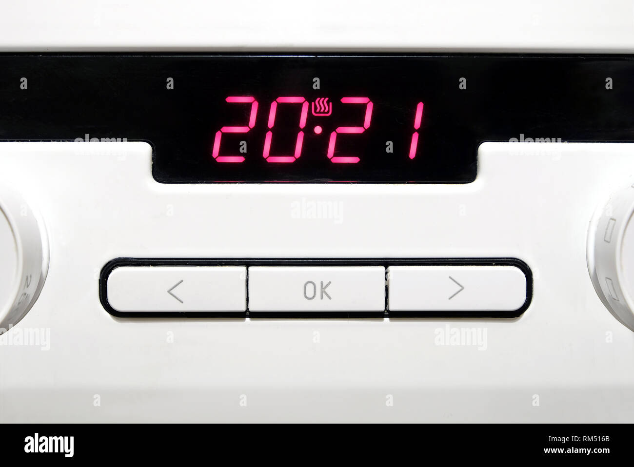 Control panel with red digits on electronic timer display, buttons and ...