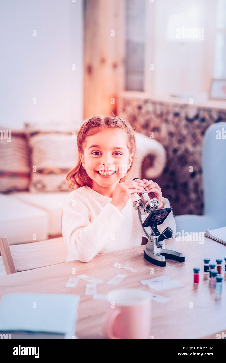 Happy child liking personal lesson of Biology Stock Photo - Alamy
