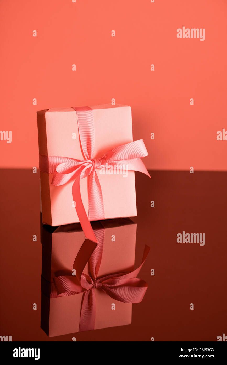 birthday gift box in living coral color. Pantone color of the year 2019 ...