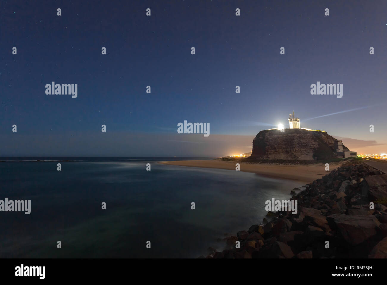 An illuminated noght view of Nobbys Lighthouse - Newcastle NSW ...
