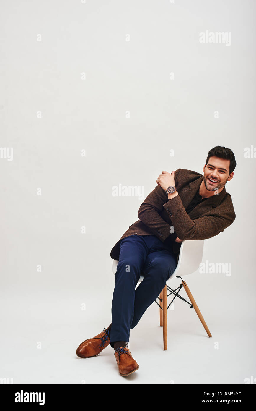 Jacket on back of chair hi-res stock photography and images - Alamy