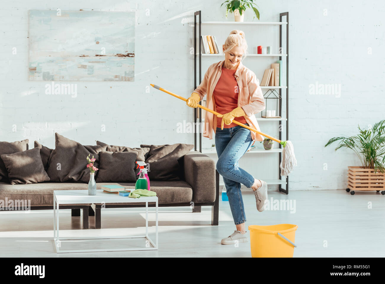 Woman dancing home cleaning hi-res stock photography and images - Alamy