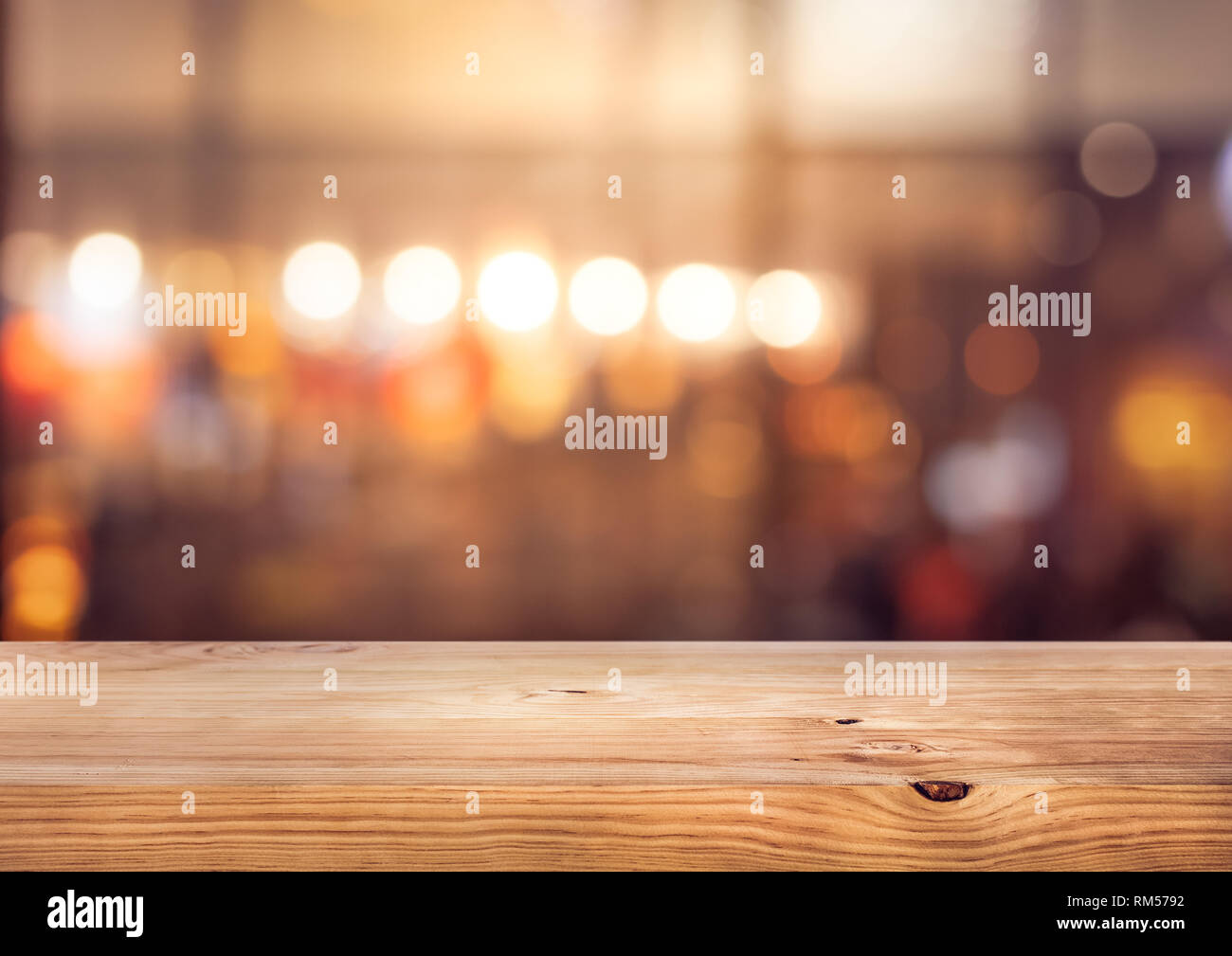 Wood table top (Bar) with blur colorful light bokeh in cafe,restaurant ...