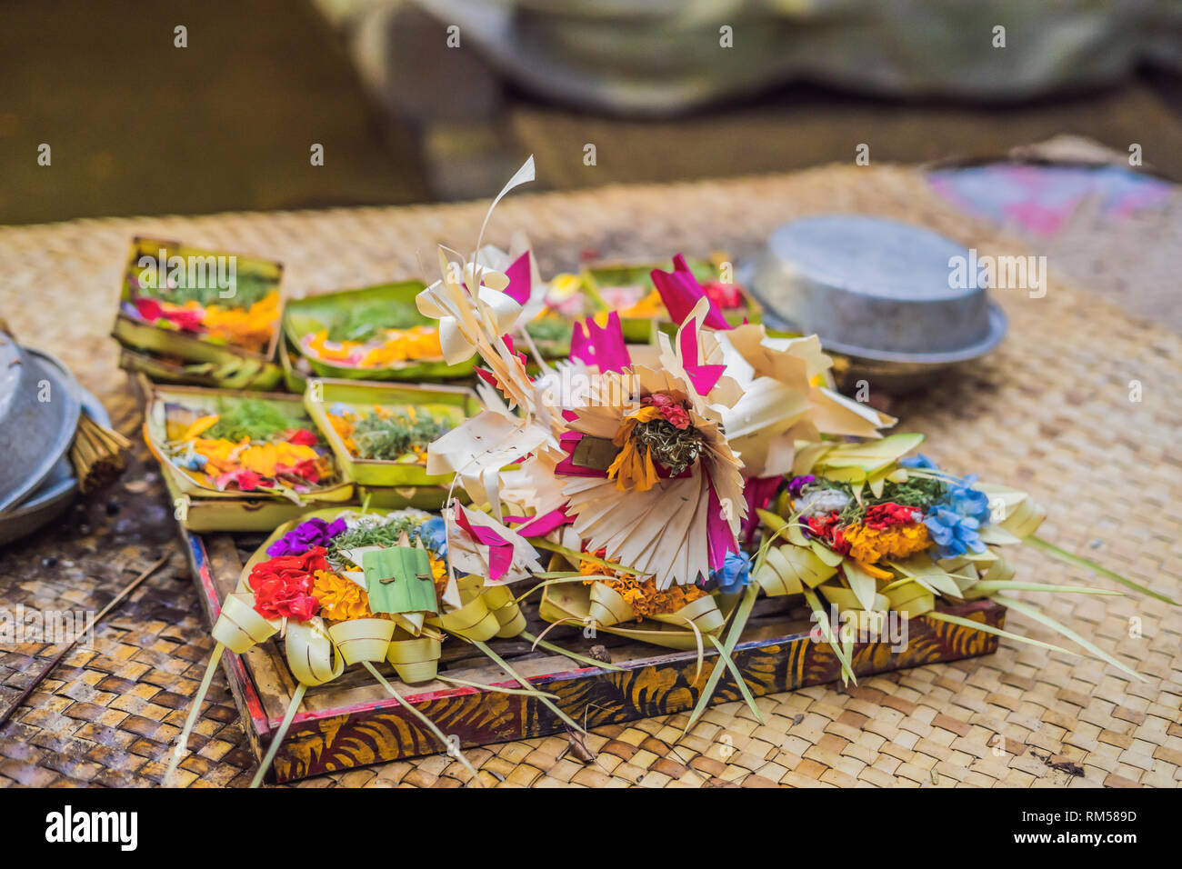 Traditional balinese offerings to gods in Bali with flowers and ...