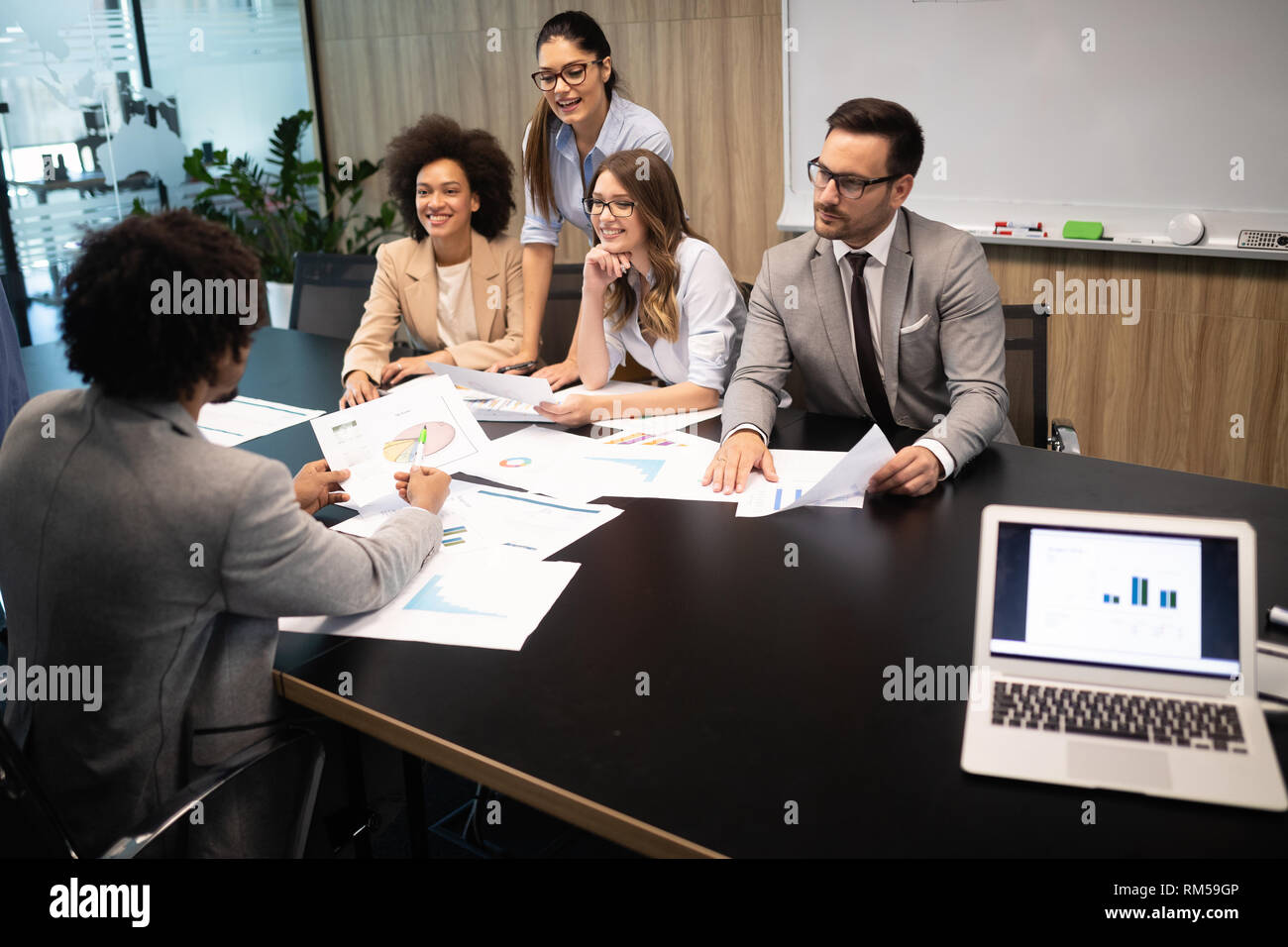 Business colleagues having meeting in conference room in office Stock ...