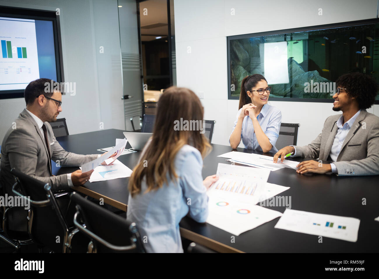 Business colleagues having meeting in conference room in office Stock ...