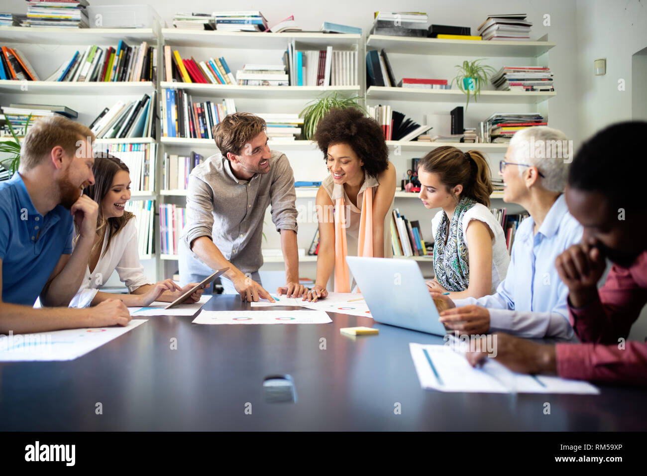 Old and young people in an office hi-res stock photography and images ...