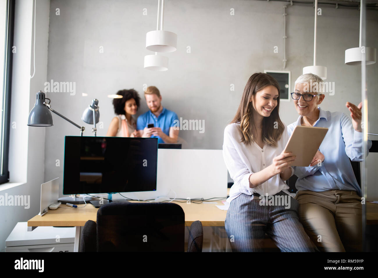 Programmer working in a software developing company office Stock Photo ...