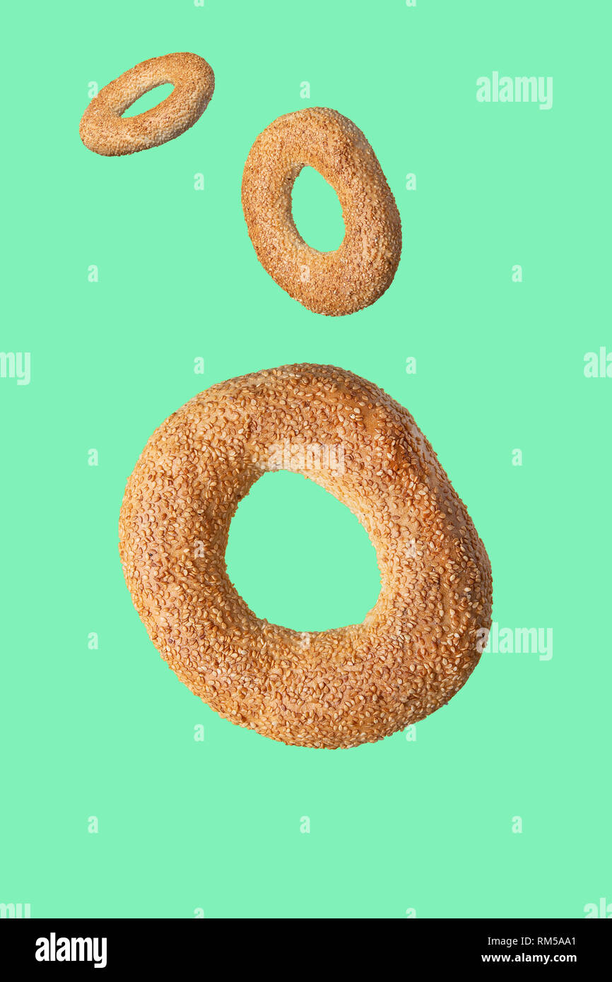 Flying Food Concept Turkish Traditional Sesame Bagels on Green ...