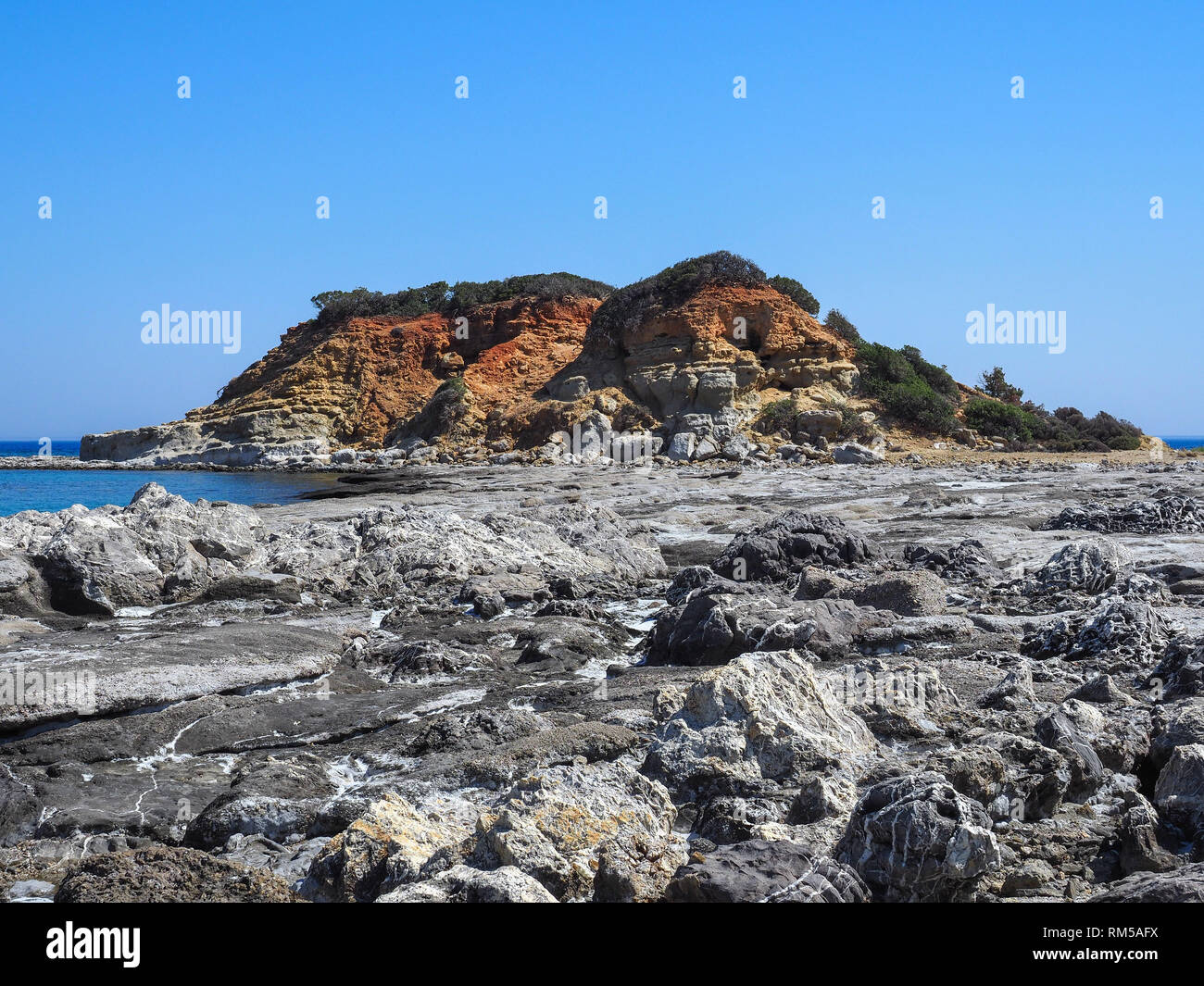 Wonderful beauty wild beach with stony rocky shore and in the distance ...