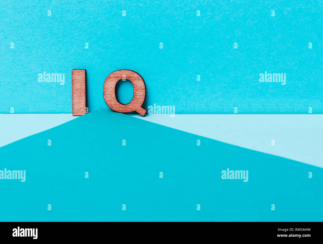 word IQ on a blue background. Intellect and mind Stock Photo - Alamy