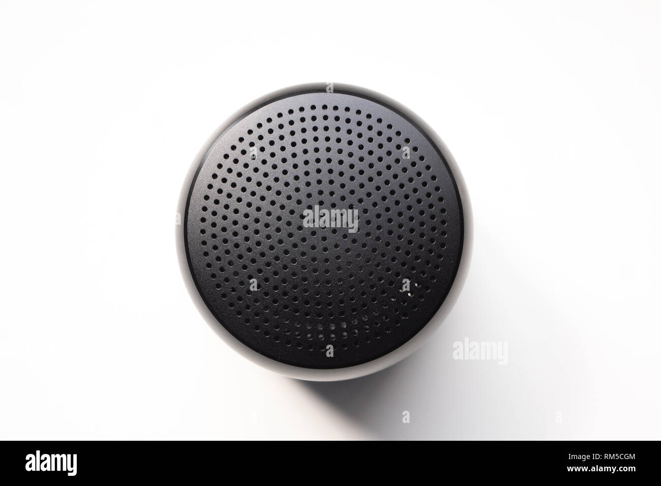 Portable round wireless bluetooth speaker with dotted metal grille ...